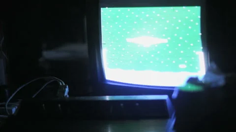 Old console in front of monitor screen | Stock Video | Pond5