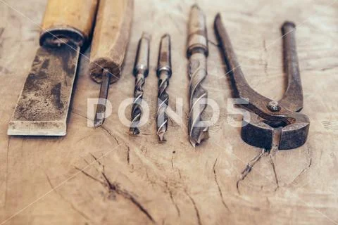 Old construction tools on a wooden workbench flat lay background ...