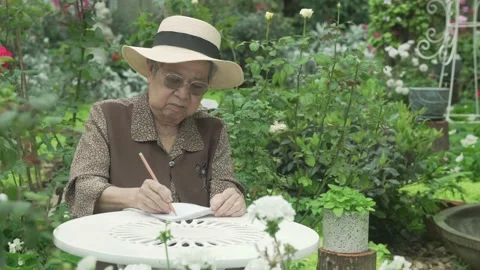 Old Woman Writing Stock Footage ~ Royalty Free Stock Videos | Pond5