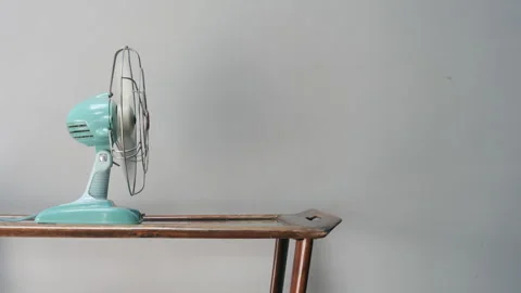 Old electric fan blowing in a room of a ... | Stock Video | Pond5