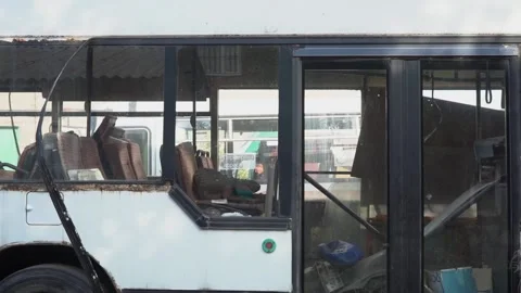 Old empty destroyed bus on parking. Acci... | Stock Video | Pond5