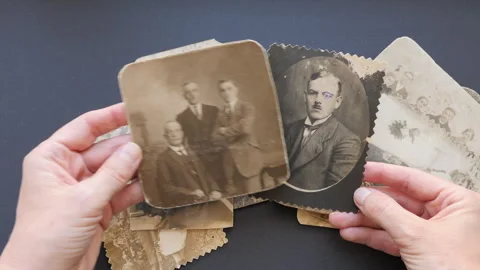 Old family photos from the beginning of ... | Stock Video | Pond5