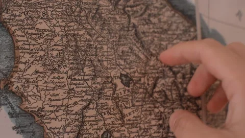 old fashioned map. man's hand using old ... | Stock Video | Pond5