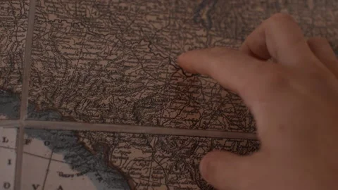 old fashioned map. man's hand using old ... | Stock Video | Pond5