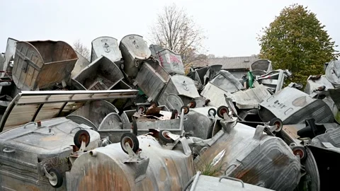 Old garbage containers. Pile of old meta... | Stock Video | Pond5