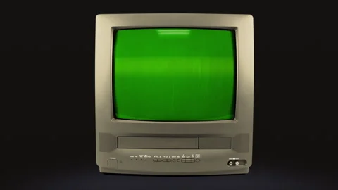 Old grey TV on a black background with a... | Stock Video | Pond5