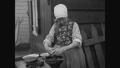 Old Lady Washing Clothes In Her Yard | Stock Video | Pond5