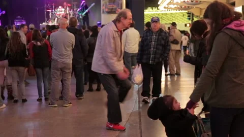 Old man dancing to a rock music concert ... | Stock Video | Pond5