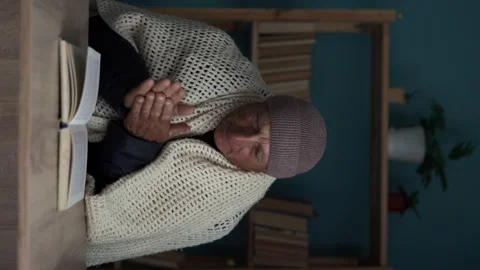 Old man feeling cold at home with home h... | Stock Video | Pond5