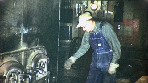 Old Man Fuels BOILER ROOM FURNACE 1950s ... | Stock Video | Pond5