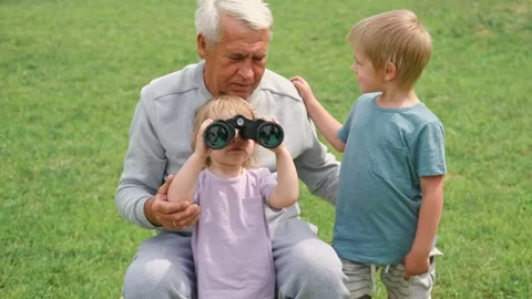 Old man grandpa playing with children us... | Stock Video | Pond5