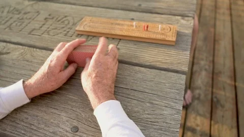 Old Man Hands Shuffling Cards on Woode T... | Stock Video | Pond5