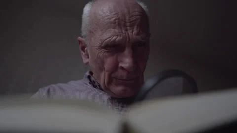 Old man with high temple and magnifier s... | Stock Video | Pond5