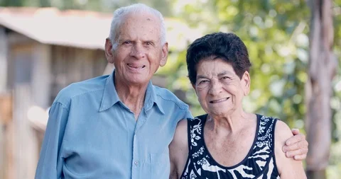 Old man in love kissing his wife. 4K Red... | Stock Video | Pond5