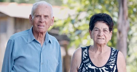 Old man in love kissing his wife. 4K Red... | Stock Video | Pond5