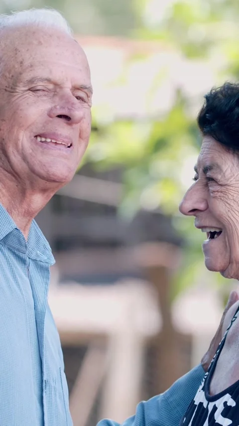 Old man in love kissing his wife. Vertic... | Stock Video | Pond5