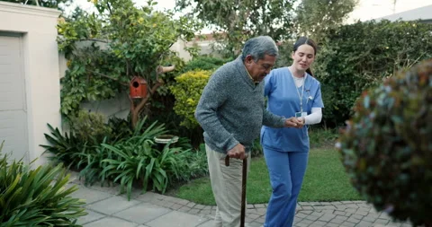 Old man, nurse and helping hand to walk ... | Stock Video | Pond5