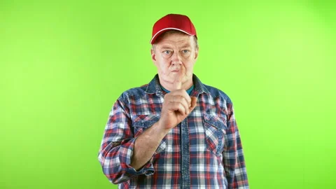 Old man in red baseball cap pointing at ... | Stock Video | Pond5