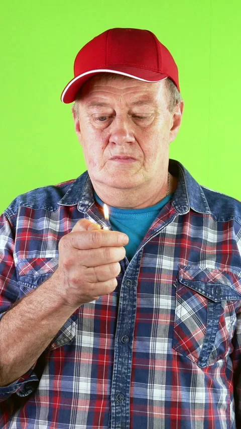 Old man in red baseball cap looking at b... | Stock Video | Pond5