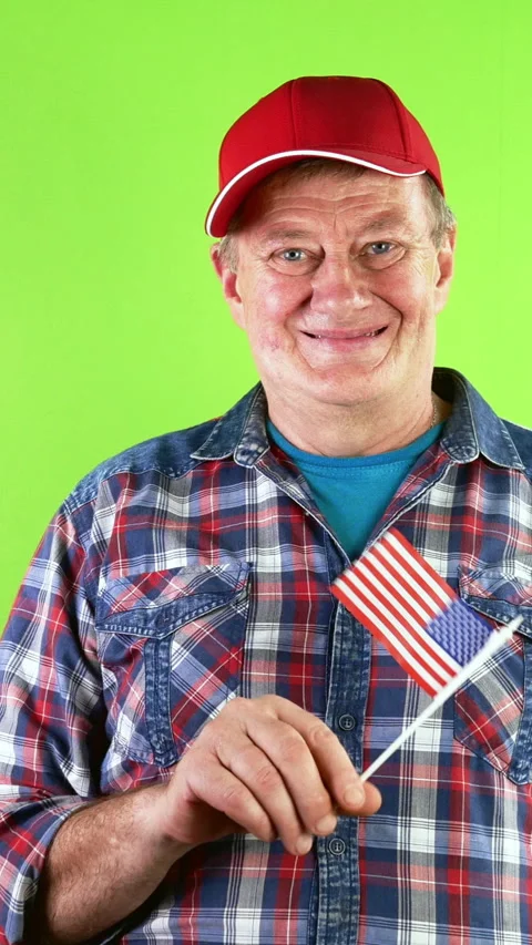 Old man in red baseball cap waving Ameri... | Stock Video | Pond5