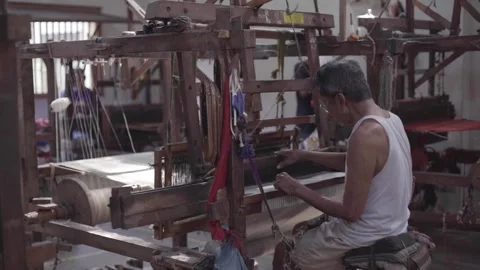 Old man is weaving traditional cloth on ... | Stock Video | Pond5
