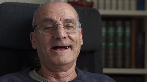 Old man without teeth laughing looking a... | Stock Video | Pond5