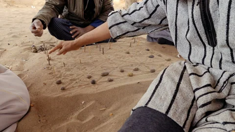 Old men play dama game, checkers, in san... | Stock Video | Pond5