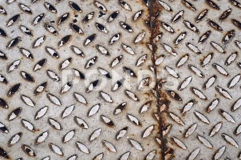 Old metal background texture with rust and raised diamond texture bumps ...