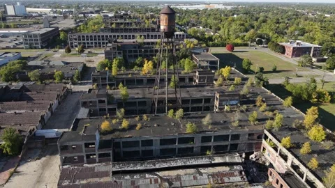 Old Packard Plant with rusty water tower... | Stock Video | Pond5