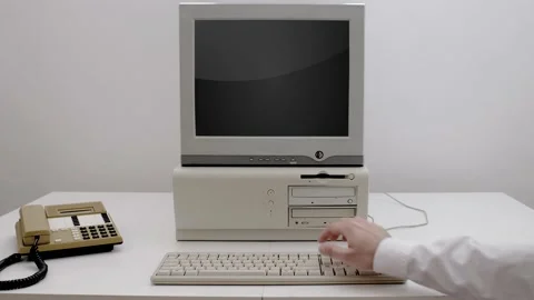 Old Pc is slapped to turn on Green scree... | Stock Video | Pond5