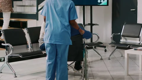 Old person in wheelchair meeting with pe... | Stock Video | Pond5