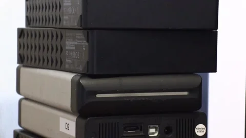 Old pile of external computer storage di... | Stock Video | Pond5