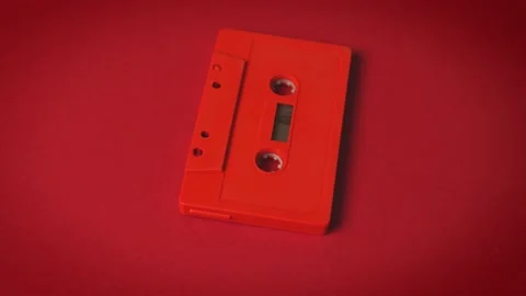 old red cassette tape on a minimalist ba... | Stock Video | Pond5