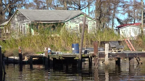 An old run down shack along the bayou in... | Stock Video | Pond5