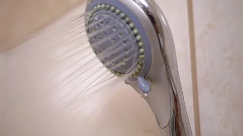 Old Shower Head with a Powerful Stream o... | Stock Video | Pond5