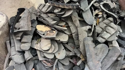 old soles on a pile Cu Chi tunnels were ... | Stock Video | Pond5