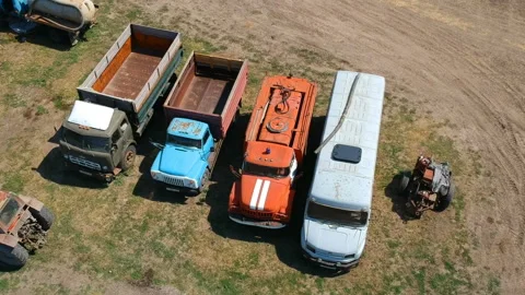 Old soviet trucks stand broken on the co... | Stock Video | Pond5