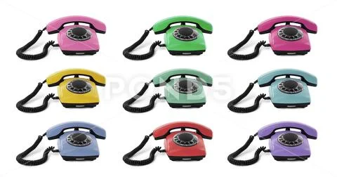 Old telephone with rotary dial of different colors isolated on white ...