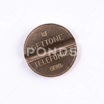 Stock Photograph: Old telephone token ~ Image #144657402