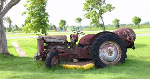Old tractor machine for mixing cement in... | Stock Video | Pond5