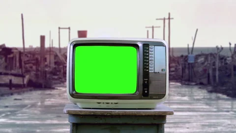 Old TV With Green Screen on a Street in ... | Stock Video | Pond5
