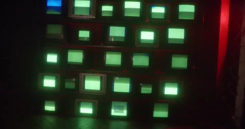 Old TV sets with static turned on Green ... | Stock Video | Pond5