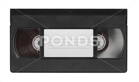 Old video cassette tape with blank label top view isolated on white ...