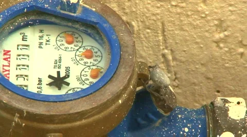 Old water meter with fast spinning dial ... | Stock Video | Pond5
