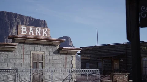 Old west town bank sign and mountains in... | Stock Video | Pond5