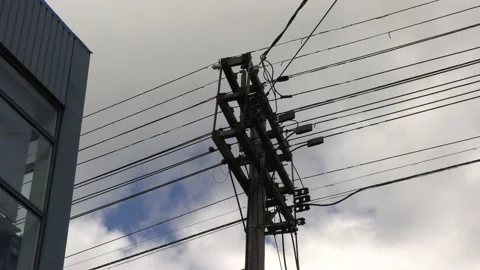 Old wooden electrical grid and pole and ... | Stock Video | Pond5