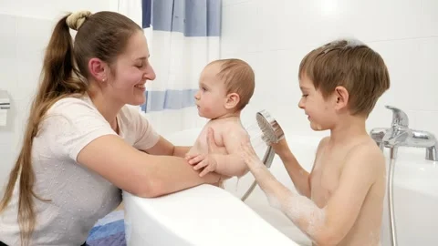 Mother and Son Shower Together Stock Footage ~ Royalty Free Stock ...
