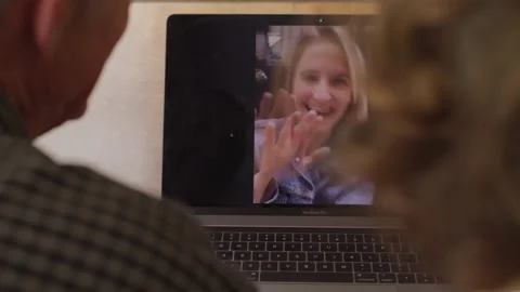 Older Couple's Hands Waving at a Laptop ... | Stock Video | Pond5