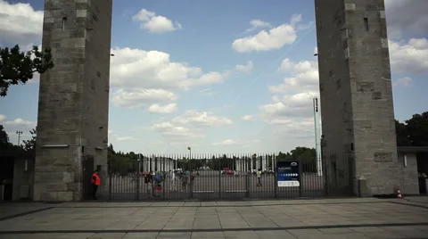 Olympic Stadium gate, tilt up to main en... | Stock Video | Pond5