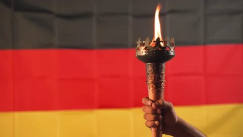 Olympic torch with background Germany fl... | Stock Video | Pond5